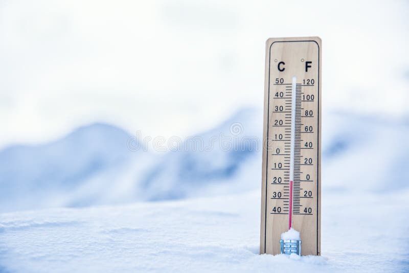 Thermometer on the Mountains in the Snow Shows Temperatures Below Zero ...