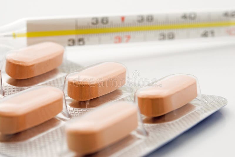 Thermometer and pills stock image. Image of painkiller - 22504273
