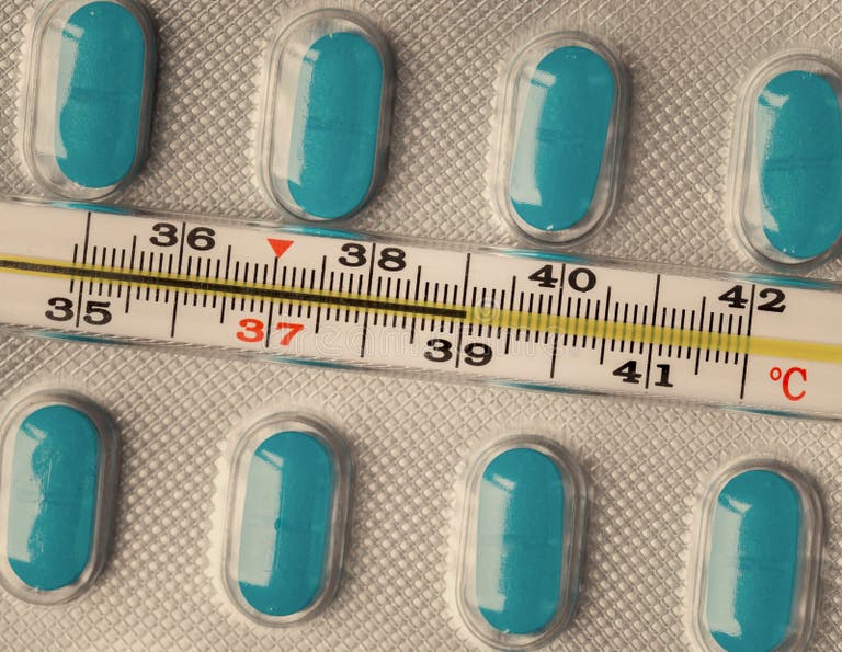Thermometer and pills stock photo. Image of drugs, graduate - 66489198