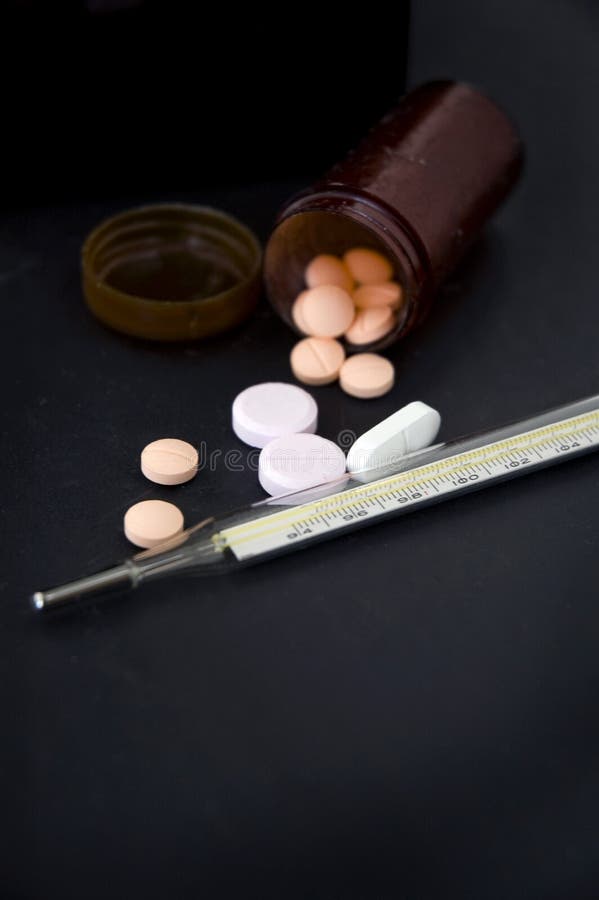 Thermometer and pills stock photo. Image of heat, medicine - 55369304