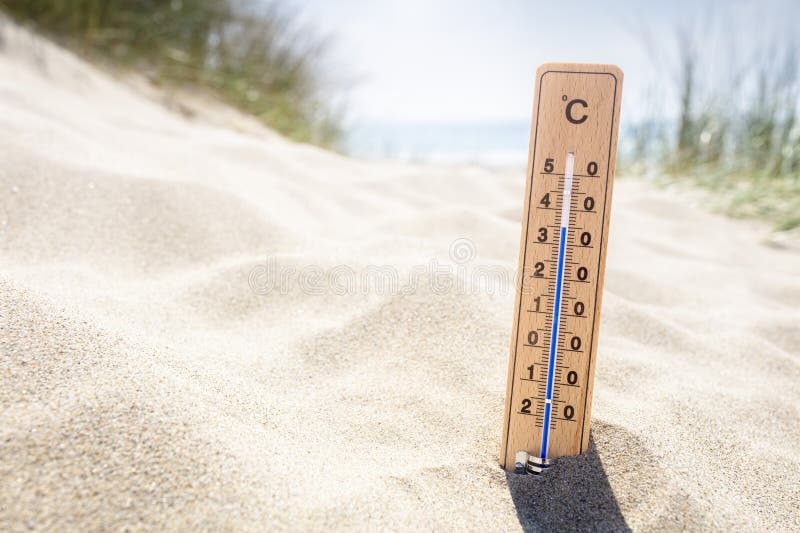 Thermometer in Sand on the Beach Showing High Temperature Background ...