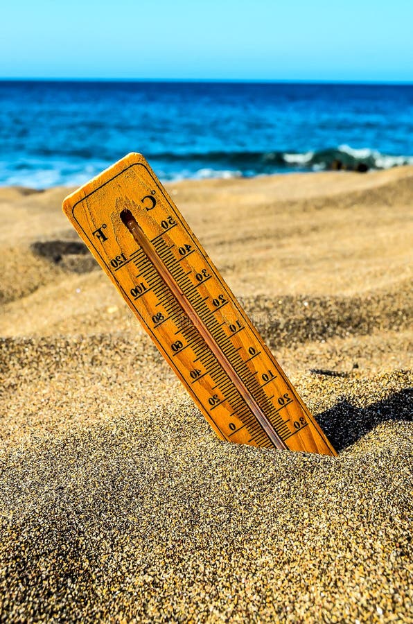 A Thermometer is Sitting in the Sand on a Beach Stock Image - Image of ...