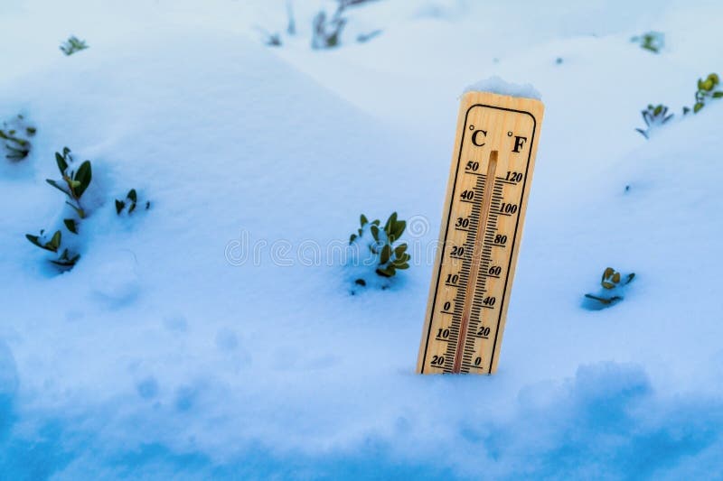 Thermometer in the Snow Shows Zero Temperature before Spring Stock ...