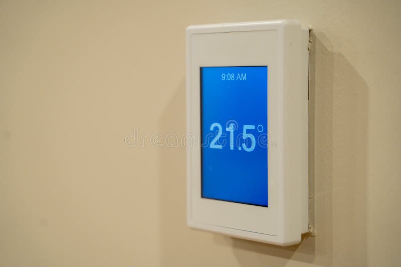 Thermometer and Temperature Display on the Wall Stock Photo - Image of ...