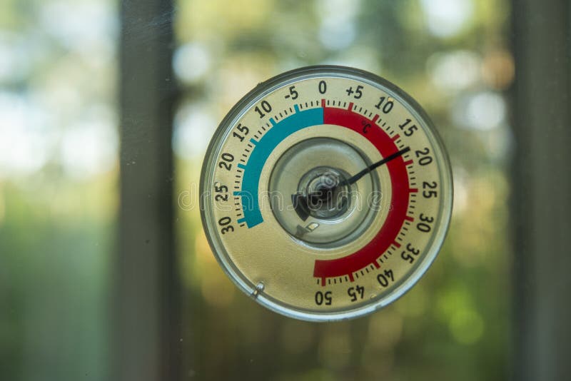 A Thermometer of Temperature Outside the Window that Hangs on the ...