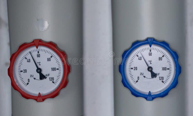 Thermometers of Flow and Return Pipes of a Heating System Stock Photo ...