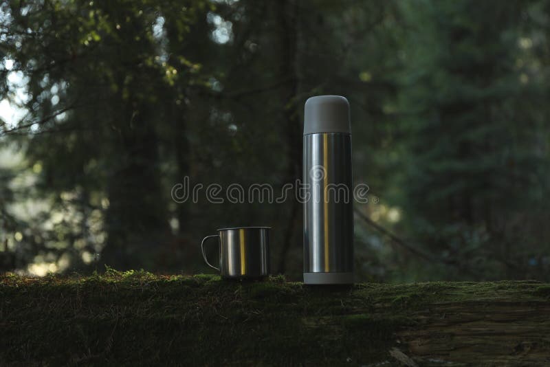 Thermos and Cup on Log in Forest Stock Photo - Image of wood, beverage ...