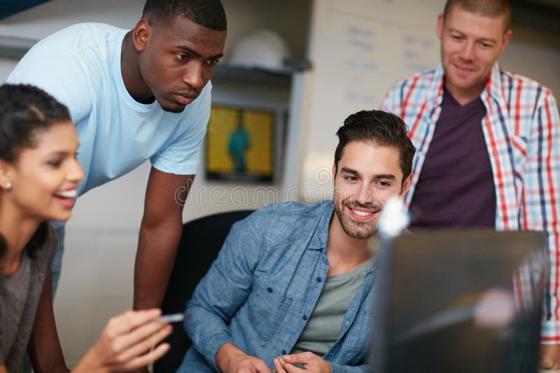 Theyre One Amazing Team. a Group of Happy Coworkers Standing in an ...