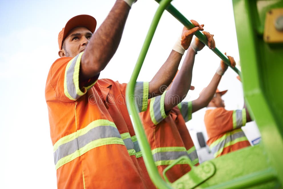 Theyre a Dedicated Team. a Garbage Collection Team at Work. Stock Photo ...