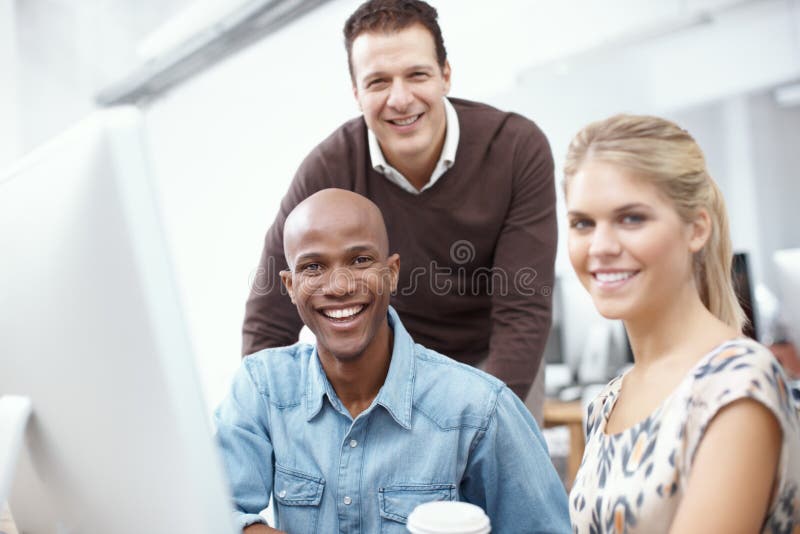 Theyre a Dedicated Team. Portrait of Two Colleagues and Their Boss at ...