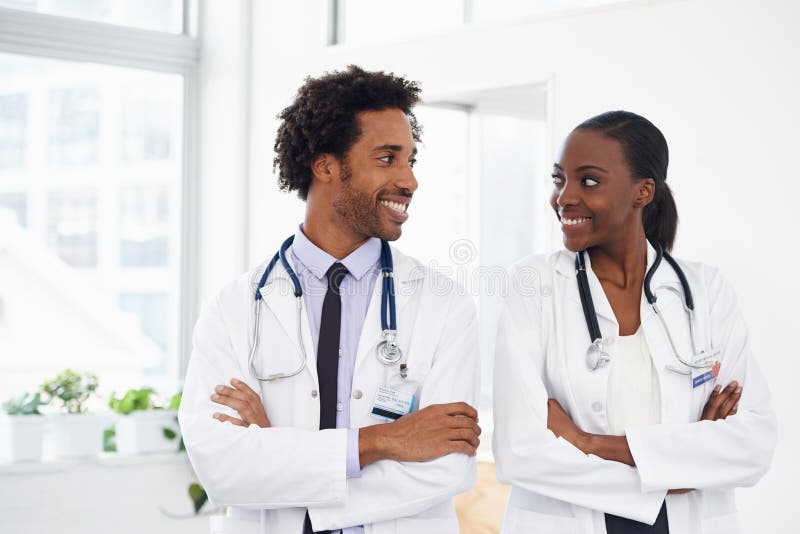 Theyre a Great Medical Team. Two Doctors Looking at Each Other. Stock ...