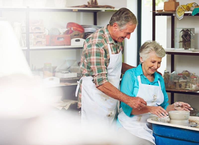 Theyre Passionate about Pottery. a Senior Couple Making a Ceramic Pot ...