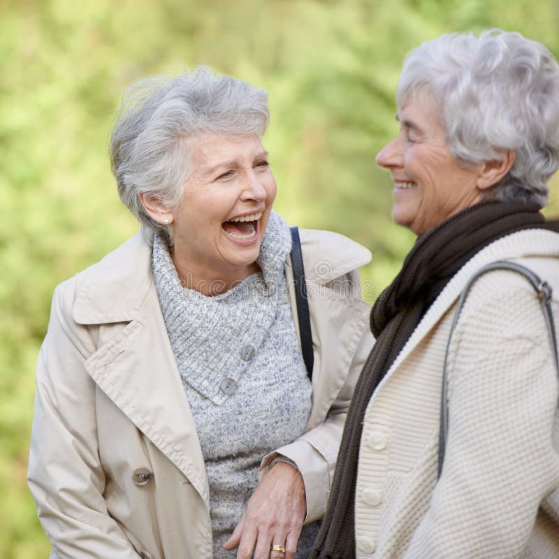 Theyre Still Best Of Friends Cropped View Of Two Aging Senior Woman Smiling And Chatting