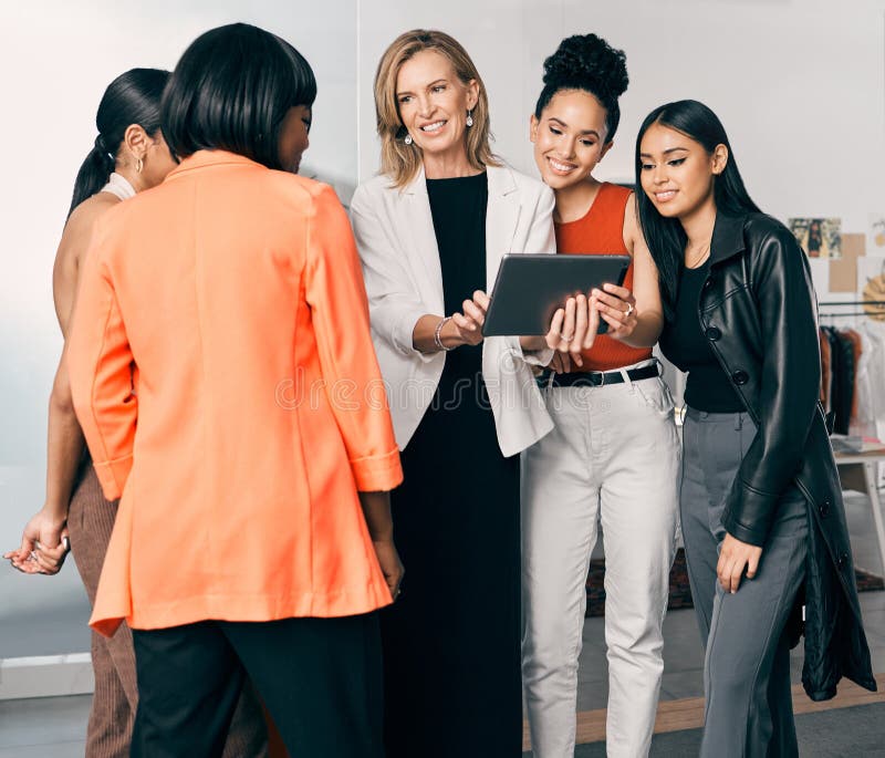 Theyve Got a Plan. a Group of Businesswomen Using a Digital Tablet ...