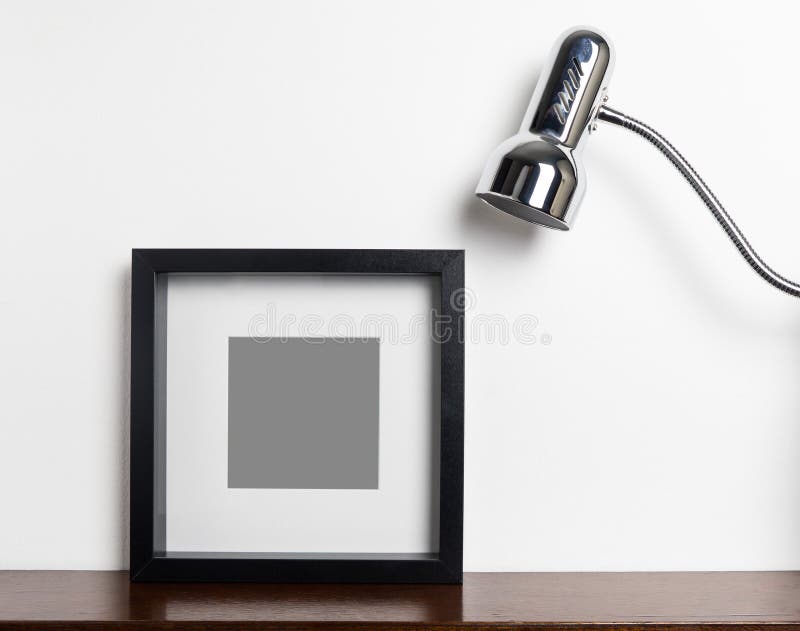 Thick Black Photo Frame with Light Lamp Stock Photo - Image of space ...