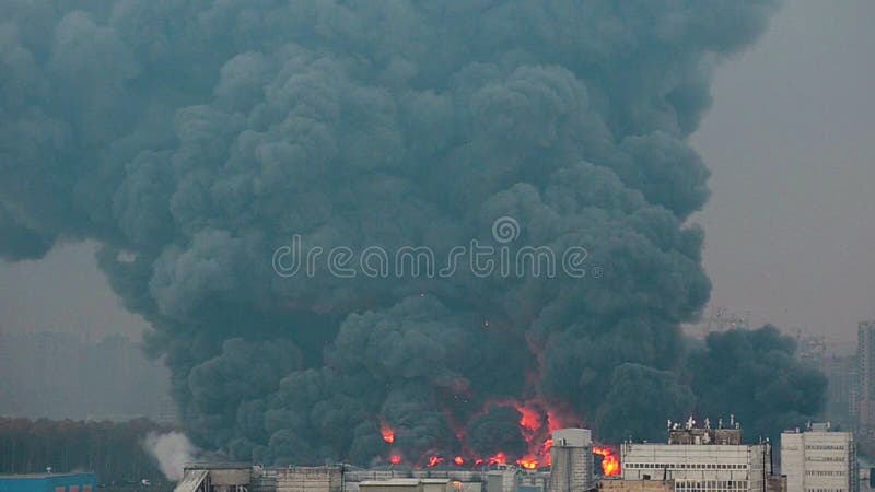 Thick Black Smoke from a Powerful Fire with a Catastrophic Explosion ...