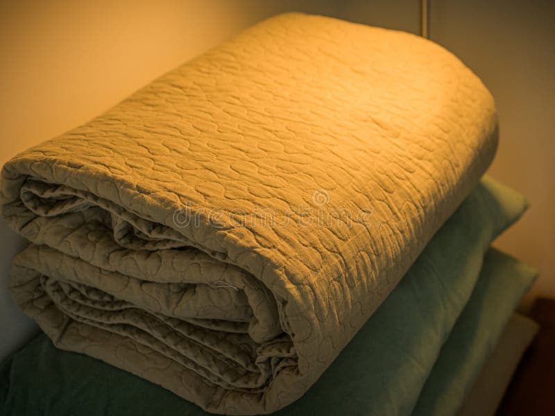 Thick Blanket Folded on Top of Stacked Pillows. Stock Image - Image of ...
