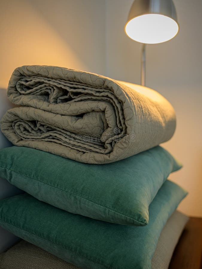 Thick Blanket Folded on Top of Stacked Pillows. Stock Photo - Image of ...