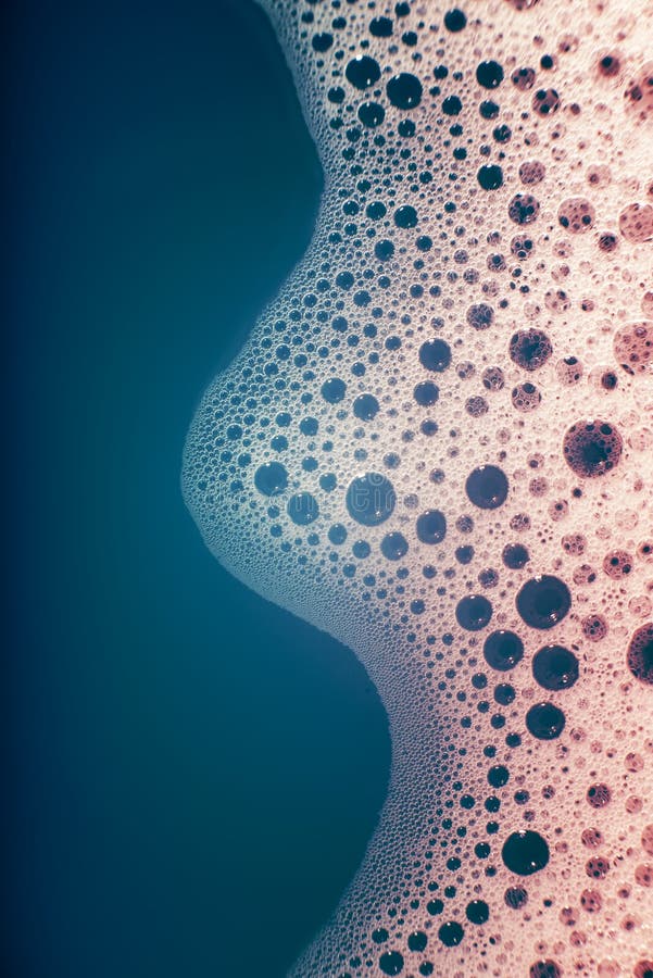 Thick Bubbling Soap Suds on the Surface of the Water. Trendy Colors ...