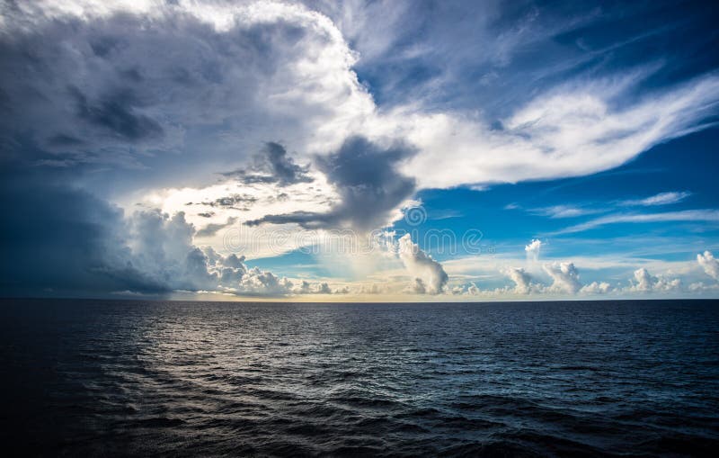 Clouds Over the Open Seas stock photo. Image of calm - 186873324