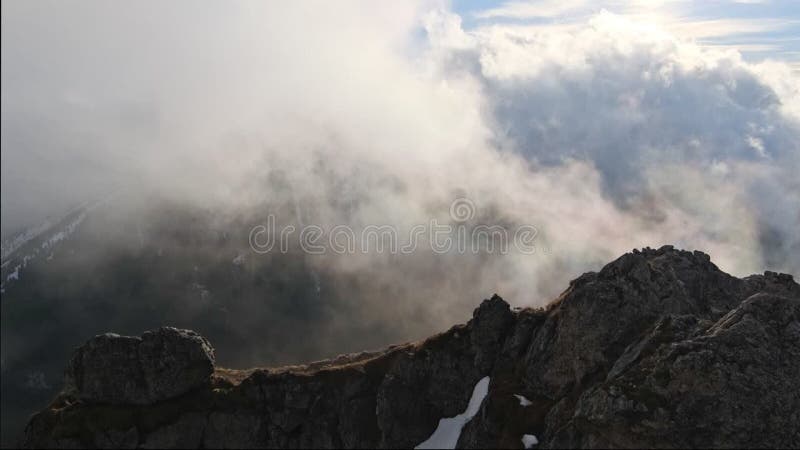 Thick Clouds from the Top of a Mountain Shrouded in Mist, the Sun ...