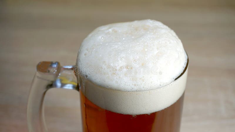 Thick Foam on Beer Poured into a Glass Goblet Stock Image - Image of ...