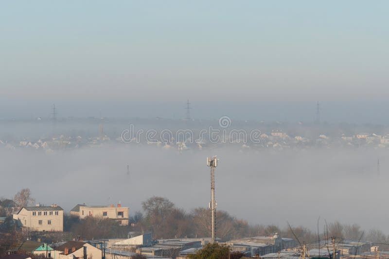 Thick Fog Rolling Over Rooftops in Suburban Landscape Stock Image ...
