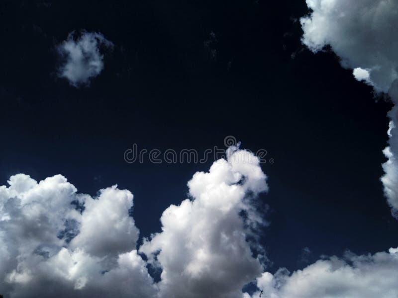 Thick Grey Clouds Under a Dark Blue Sky Stock Image - Image of horizon ...