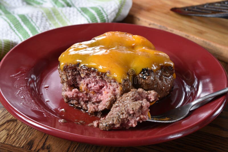 Thick Juicy Rare Cheeseburger Stock Image - Image of fork, ground ...