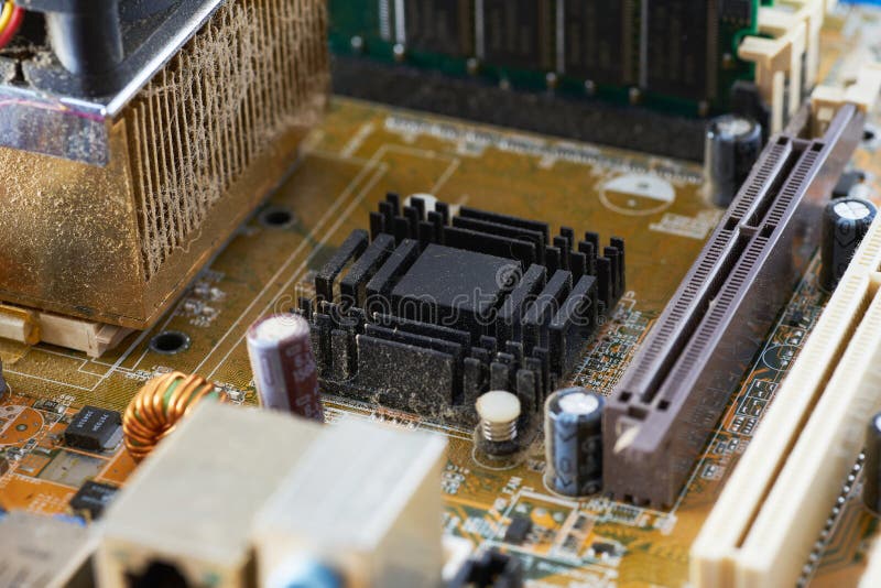 Old Motherboard Covered in Dust and Dirt. Close-up Stock Photo - Image ...