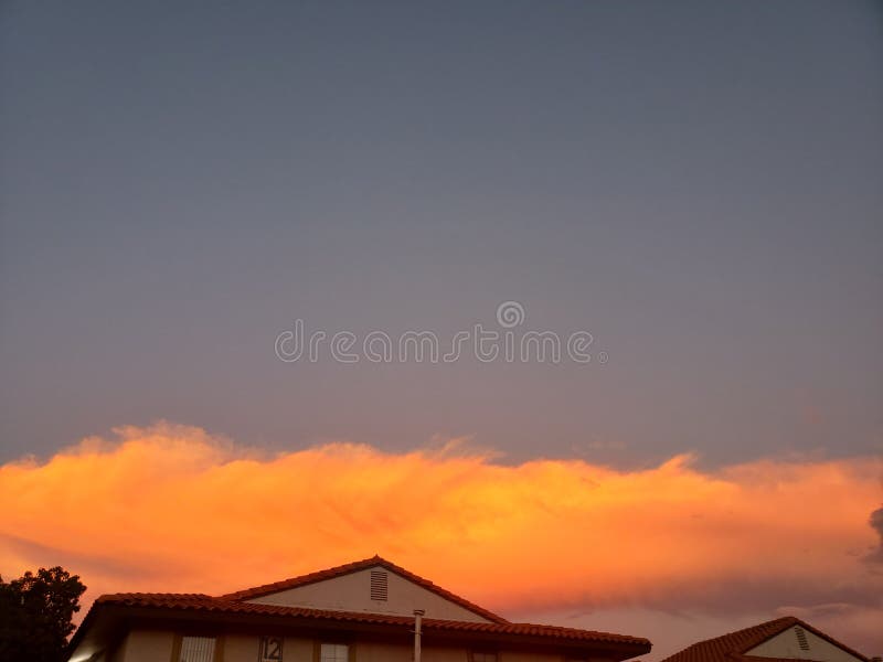Thick Orange Arizona Clouds Stock Image - Image of afterglow, clouds ...