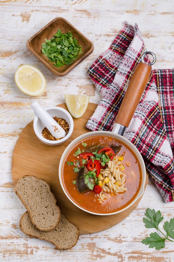 Thick red soup with pasta stock image. Image of background - 134020689