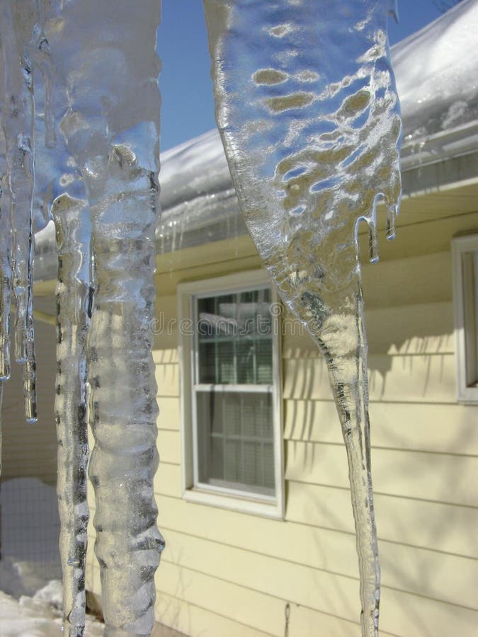 Thick Ribbed Icicles on Roof by Window Stock Photo - Image of pure ...