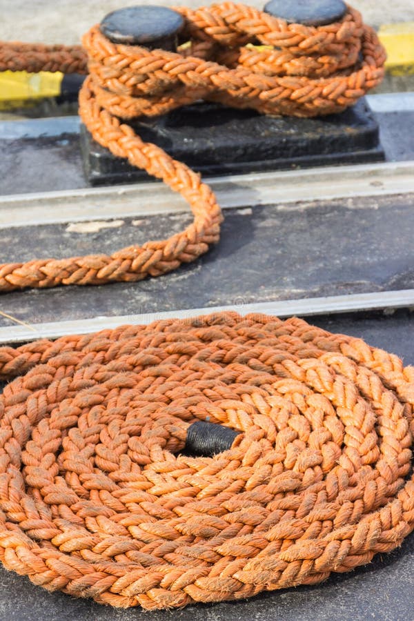 Thick Rope Coiled on Deck of Ship or Yacht Stock Image - Image of ...
