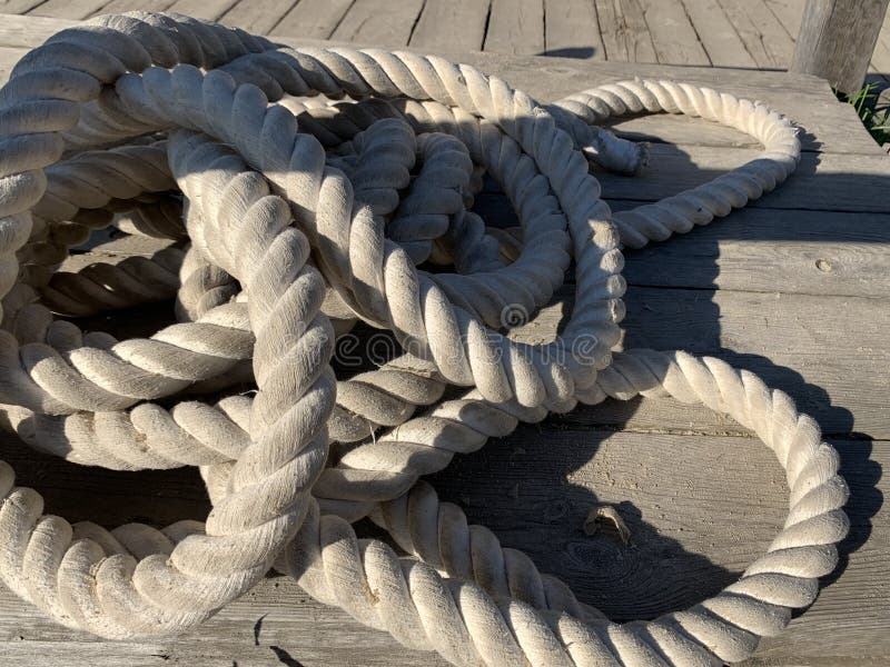 Thick Rope on the Wooden Floor. Sturdy Rope on a Plank Platform Stock ...