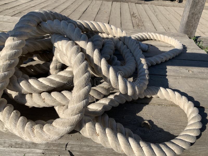 Thick Rope on the Wooden Floor. Sturdy Rope on a Plank Platform ...