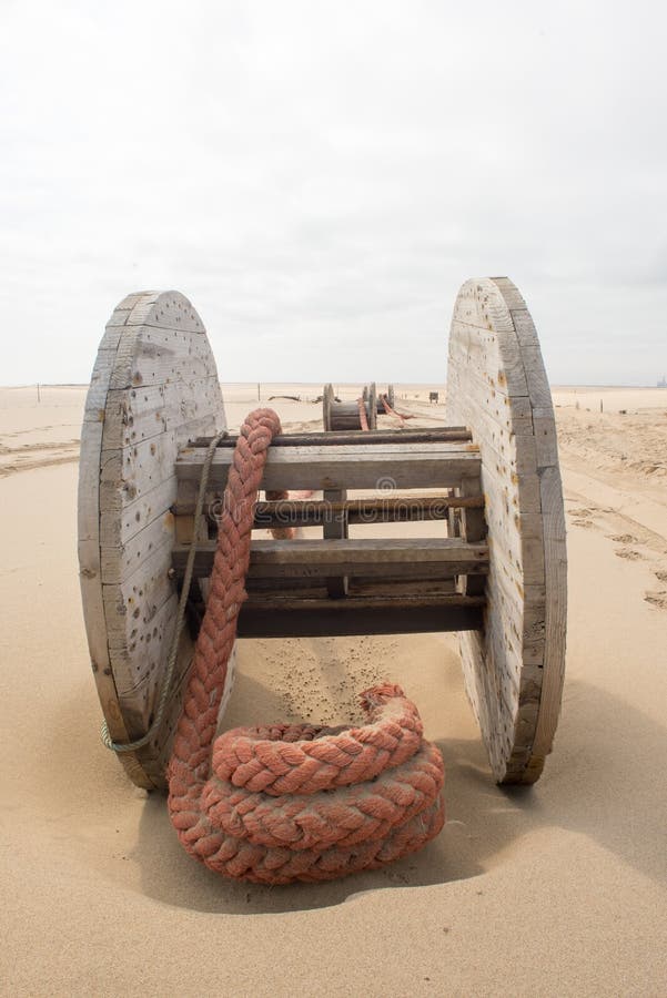 Thick Rope on Wooden Toll stock photo. Image of sand - 76121012