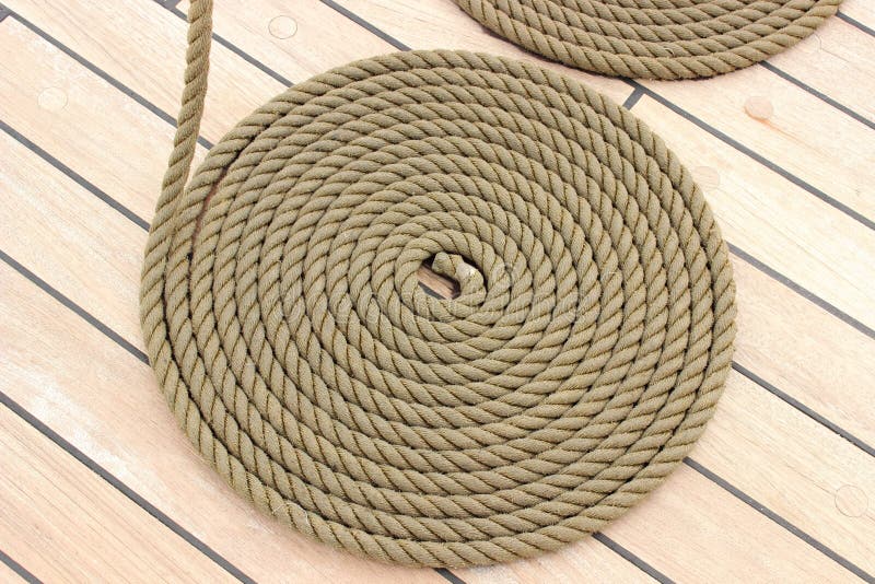 Thick Rope Wrapped in Spiral Lying on Deck of Ship Stock Photo - Image ...