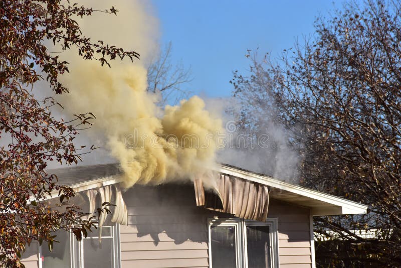 Thick Smoke Emitting from Eaves of Mobile Home. Stock Image - Image of ...