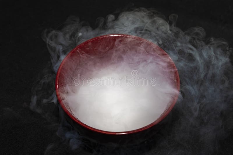 Thick Smoke from Dry Ice in a Bowl, Black Background Stock Photo ...
