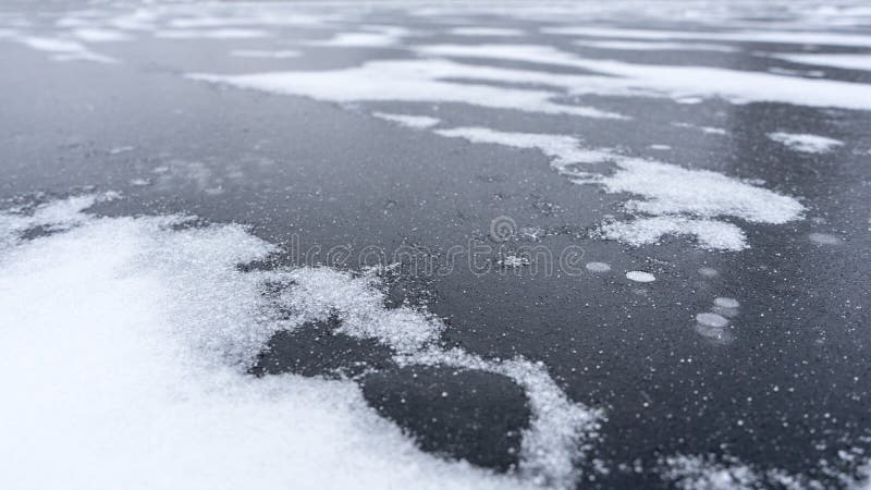 Thick Solid Layer of Ice of Frozen River with Freeze Bubbles Stock ...