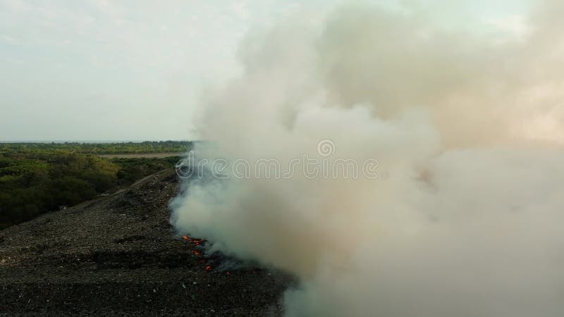 Toxic Smoke from a Fire at a Garbage Dump. the Camera is in a Cloud of ...