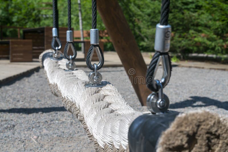 Thick White Rope Suspended from Black Ropes by Brackets. Stock Photo ...