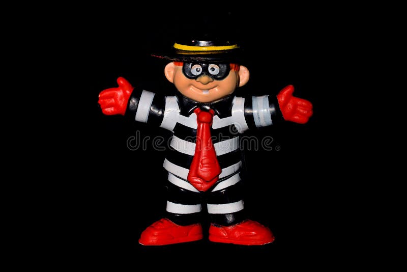 A thief as a child`s toy editorial stock image. Image of figures ...