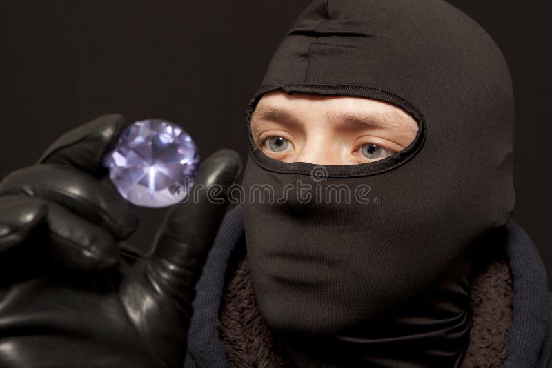 Blond Woman Cat Burglar Stealing a Large Diamond Stock Image - Image of ...