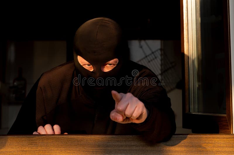 Thief in Black Cap Covering Face Caught Breaking into House, Refugee ...