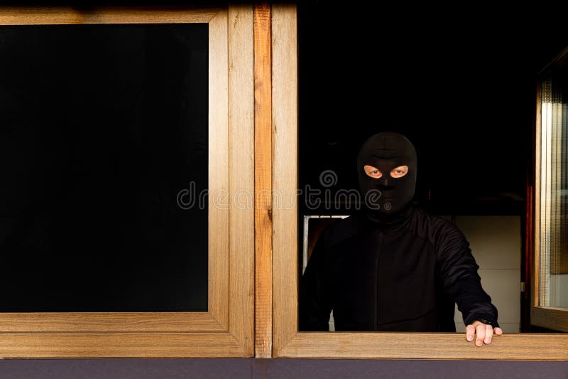 Thief in Black Cap Covering Face Caught Breaking into House, Refugee ...