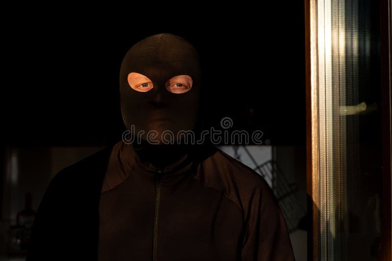 Thief in Black Cap Covering Face Caught Breaking into House, Refugee ...