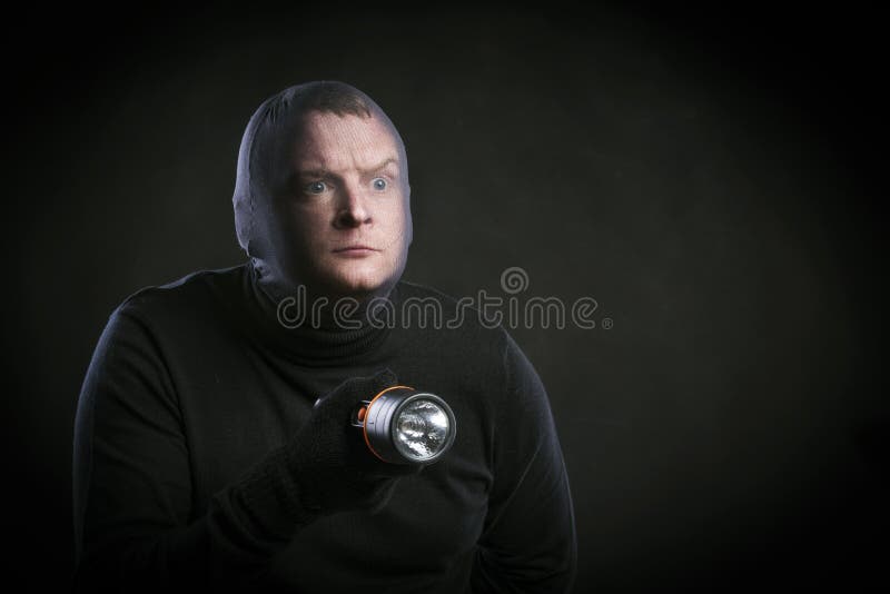Thief in black mask stock photo. Image of background - 50030950