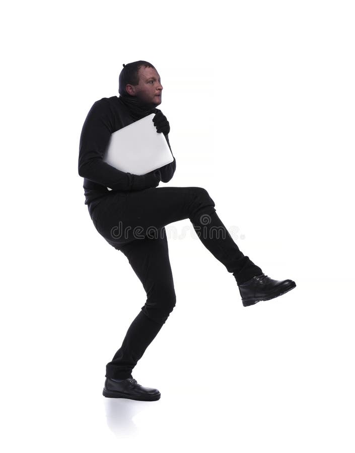 Thief in black mask stock photo. Image of adult, male - 49708170